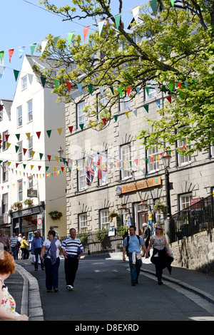 Guernsey High Street with shoppers Stock Photo - Alamy