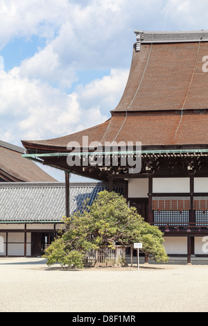 Inner courtyard with grey gravel and trees in front of Shishinden main ...
