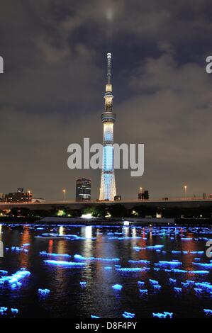 May 25, 2013, Tokyo, Japan - Some 100,000 blue LED light bulbs floats ...