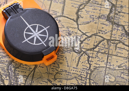 Old map, compass and divider Stock Photo - Alamy