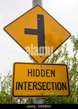 Hidden road sign Stock Photo - Alamy