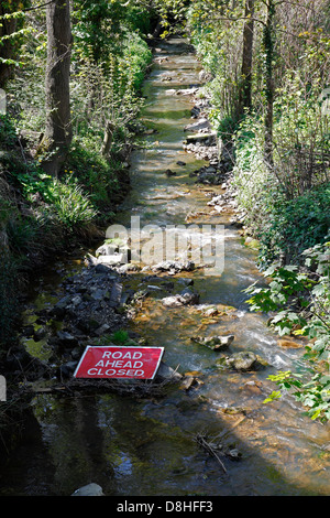 Road ahead closed sign in stream Stock Photo - Alamy