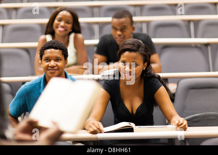 Female professor lecturing the students in amphitheatre Stock Photo - Alamy