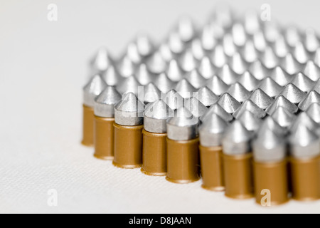 Gun bullets over white background Stock Photo - Alamy