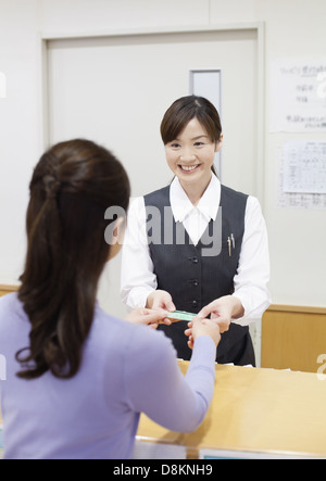 Young Japanese woman at the hospital reception Stock Photo - Alamy