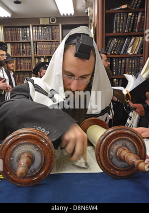 Aliyah to torah. Man in the temple celebration of bar mitzvah man is ...