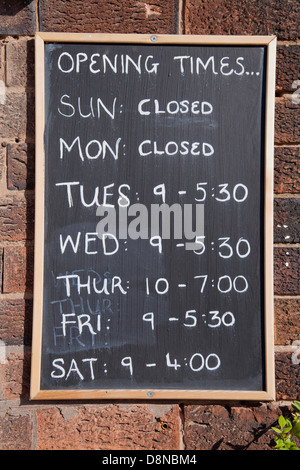 Business shop opening and closed times in hours and days Stock Photo ...
