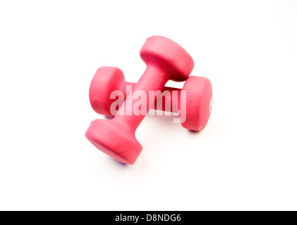 A pair of pink weights is seen against a white background Stock Photo ...
