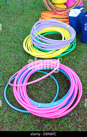 Kid playground items such hula hoops and cones Stock Photo - Alamy