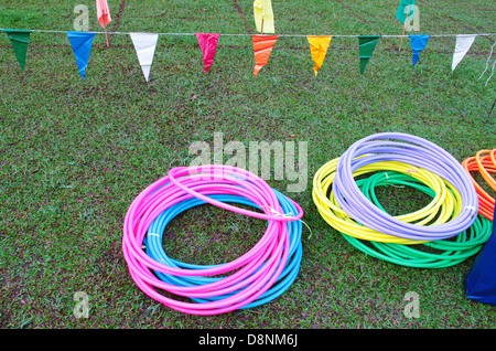 Kid playground items such hula hoops and cones Stock Photo - Alamy