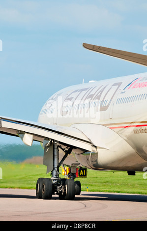 Rear view of an Etihad Airways Airbus A330 aircraft waiting for a ...