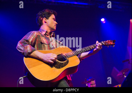 Sean Lakeman playing with Seth Lakeman band on stage at Hay Festival ...