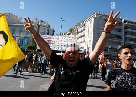 Athens, Greece. 3rd June, 2013. A protester holds up a banner during a ...
