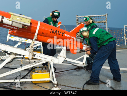 Sailors perform pre-launch checks on a BQM-74 target drone Stock Photo ...