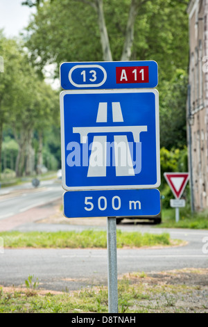 Coming up road sign on blur background Stock Photo - Alamy