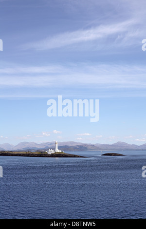 The white lighthouse on Great Benera in the Sound of Mull, Scotland ...