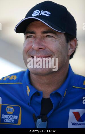 Funny Car driver Ron Capps celebrates after defeating Tim Wilderson in ...