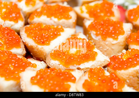 sandwiches with red caviar. selective focus. valuable food product, has ...