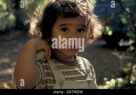 portrait angelic little multicultural girl Stock Photo - Alamy