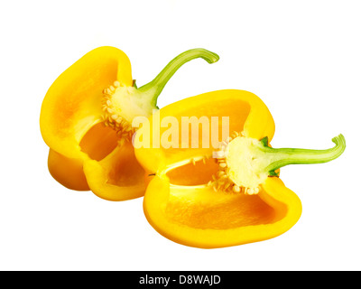 Yellow pepper cut in half showing internal flesh and seeds Stock Photo ...
