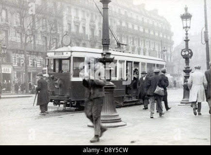 A historical photograph showing the Paris tram system in 1881. The ...