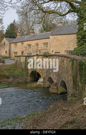 Bridge over River Dikler, Upper Swell, Gloucestershire, England Stock ...