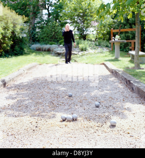 man playing boule in sweden Stock Photo - Alamy