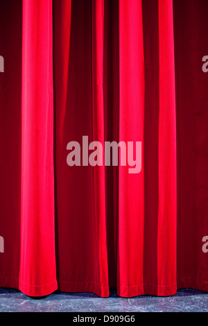 Secret behind red curtain Stock Photo - Alamy