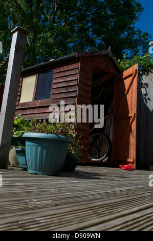 shed on decking on sunny day in sunshine Stock Photo - Alamy