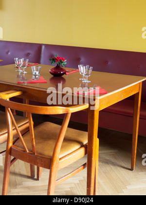 laid out table in restaurant Stock Photo - Alamy