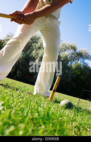 Man playing croquet Sweden Stock Photo - Alamy