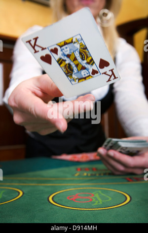 Hand of croupier Stock Photo - Alamy