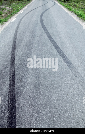Skid marks on a road Stock Photo - Alamy