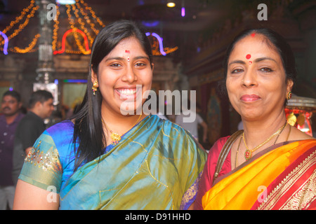 A Hindu woman with a red dot, or bindi, on her forehead at Santipur ...