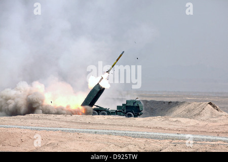 US Marines fire rockets from a M142 High Mobility Artillery Rocket ...