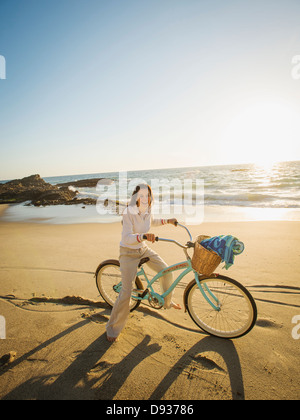 Blue bicycle, cruiser bike by ocean beach pacific coast, Oceanside California USA. Summertime ...