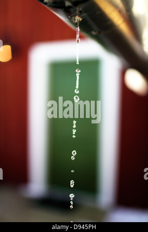 Water drops falling down Stock Photo - Alamy