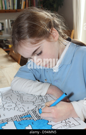 Girl Colouring in a Picture Stock Photo - Alamy