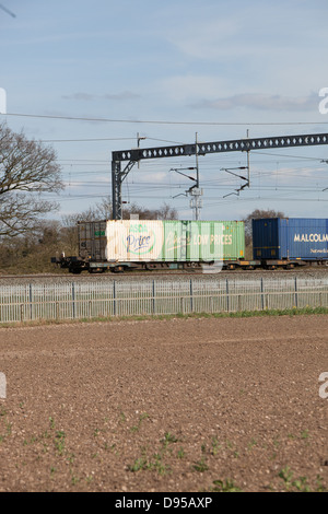 A shipping container on the railway branded for Asda supermarkets Stock ...