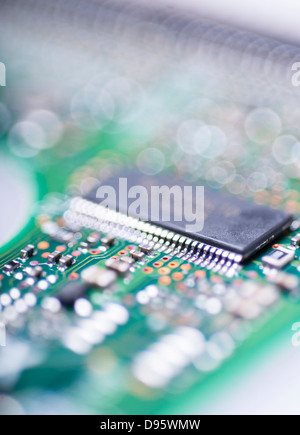 Close up macro of IC integrated circuit on electronic circuit board ...