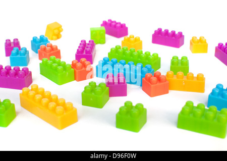 colorful plastic blocks over a white background Stock Photo - Alamy