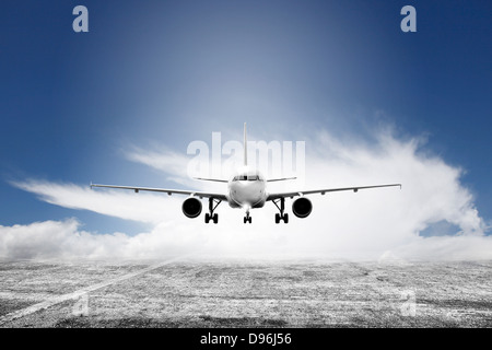 Commercial airplane seen from the front Stock Photo - Alamy