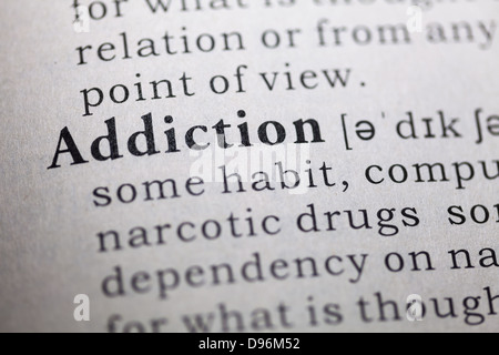 Close up of a dictionary word “addiction” Stock Photo - Alamy
