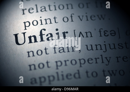 Dictionary definition of the word unfair Stock Photo - Alamy