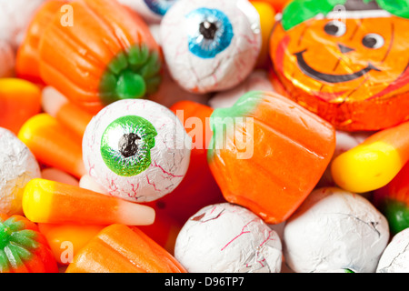 Spooky Orange Halloween Candy against a background Stock Photo - Alamy
