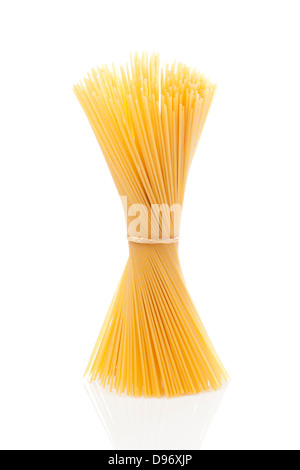 A Bundle of dry spaghetti ready to cook Stock Photo - Alamy