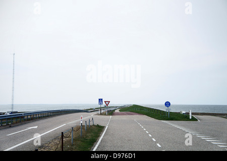 Breezanddijk, Afsluitdijk causeway, cycling path, cyclists Stock Photo ...