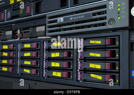 HP rack mounted servers in a cabinet Stock Photo - Alamy