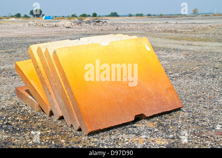 Stack of mineral tainted concrete slabs Stock Photo - Alamy