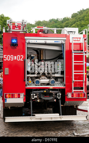 Fire truck equipment inside back of the car. Open back side of red ...